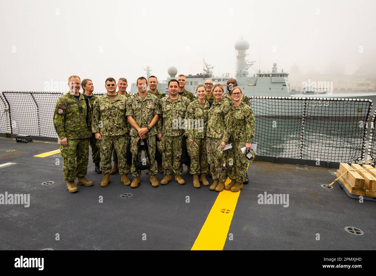 Canadian and American military medical staff stand together on the ...