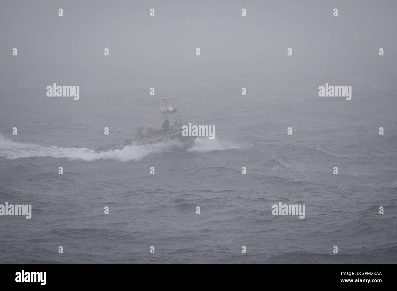 Royal Canadian Navy Rigid Hull Inflatable Boat (RHIB) at sea in heavy ...