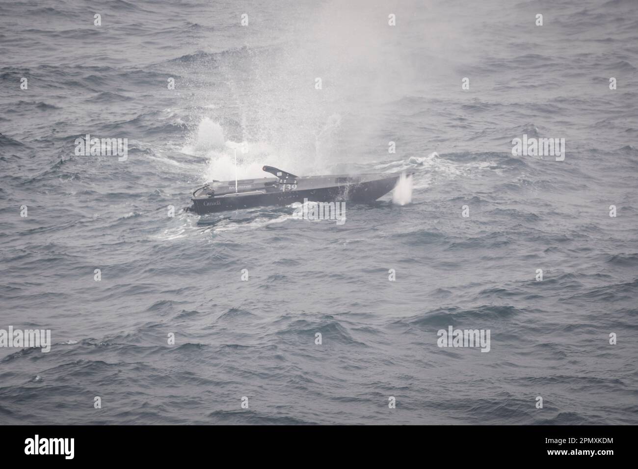 Crew members onboard HMCS Margaret Brooke training at firing a 0.50 ...