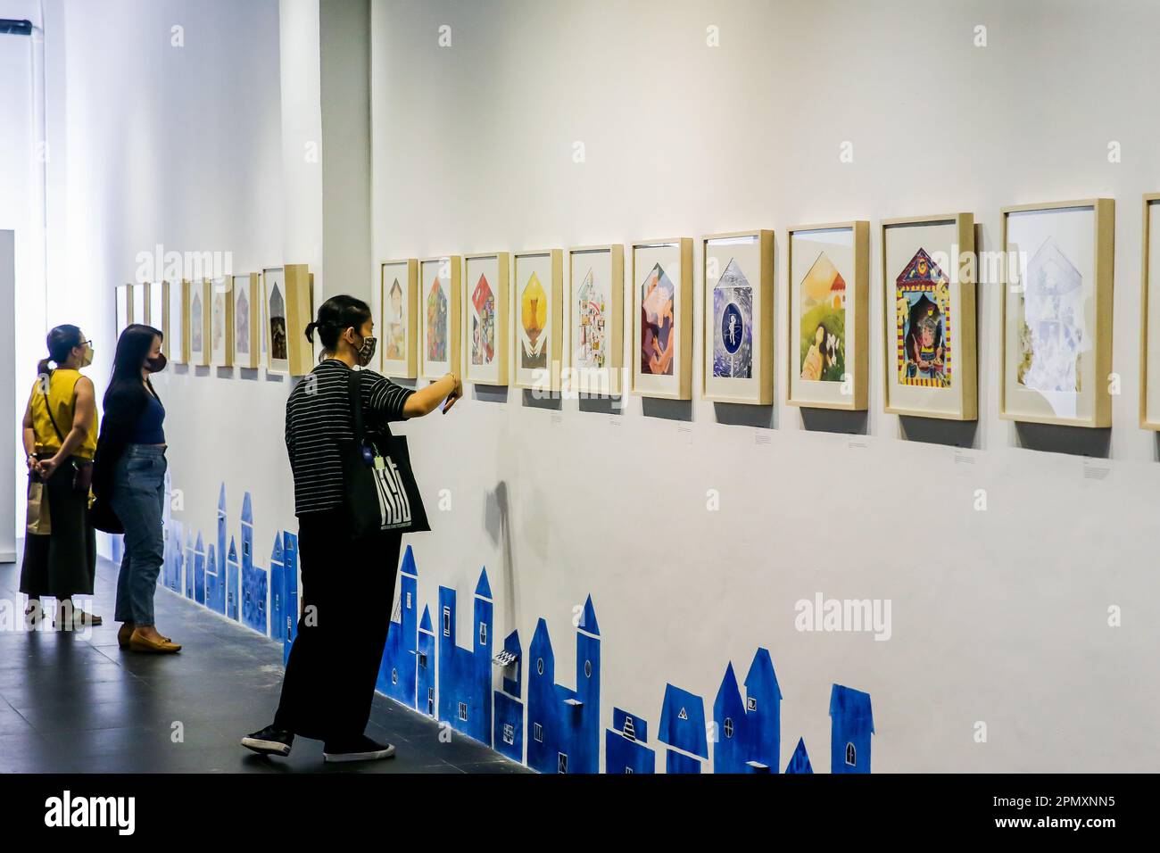 Quezon City, Philippines. 15th Apr, 2023. People visit an art ...