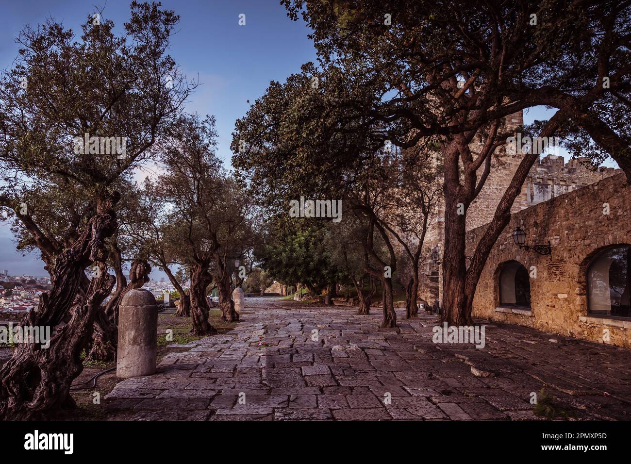 Brick wall and columns as part of the Saint George's Castle in Lisbon ...