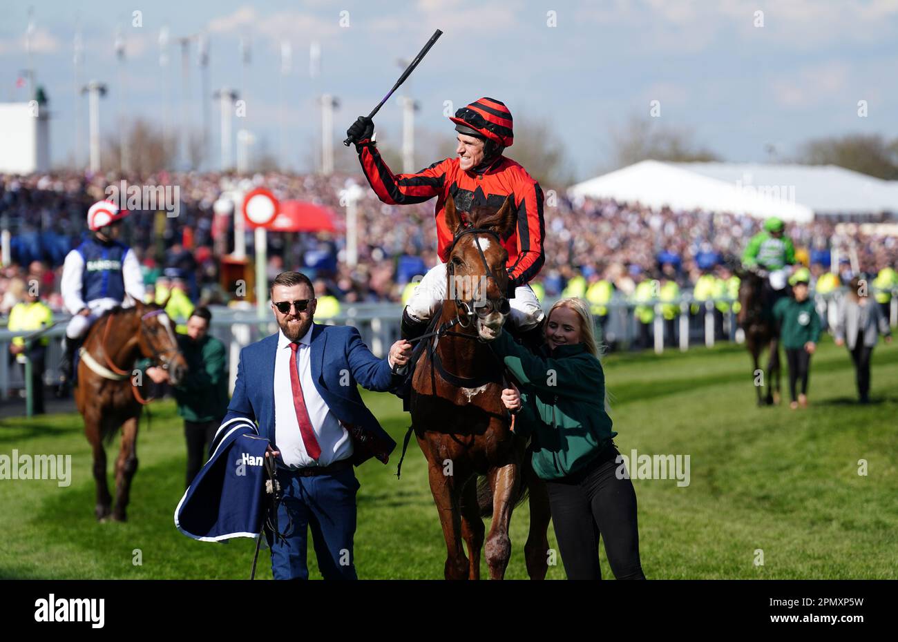Jockey Harry Skelton celebrates after winning the William Hill Handicap ...