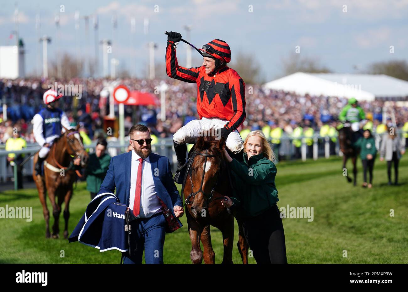 Jockey Harry Skelton celebrates after winning the William Hill Handicap ...