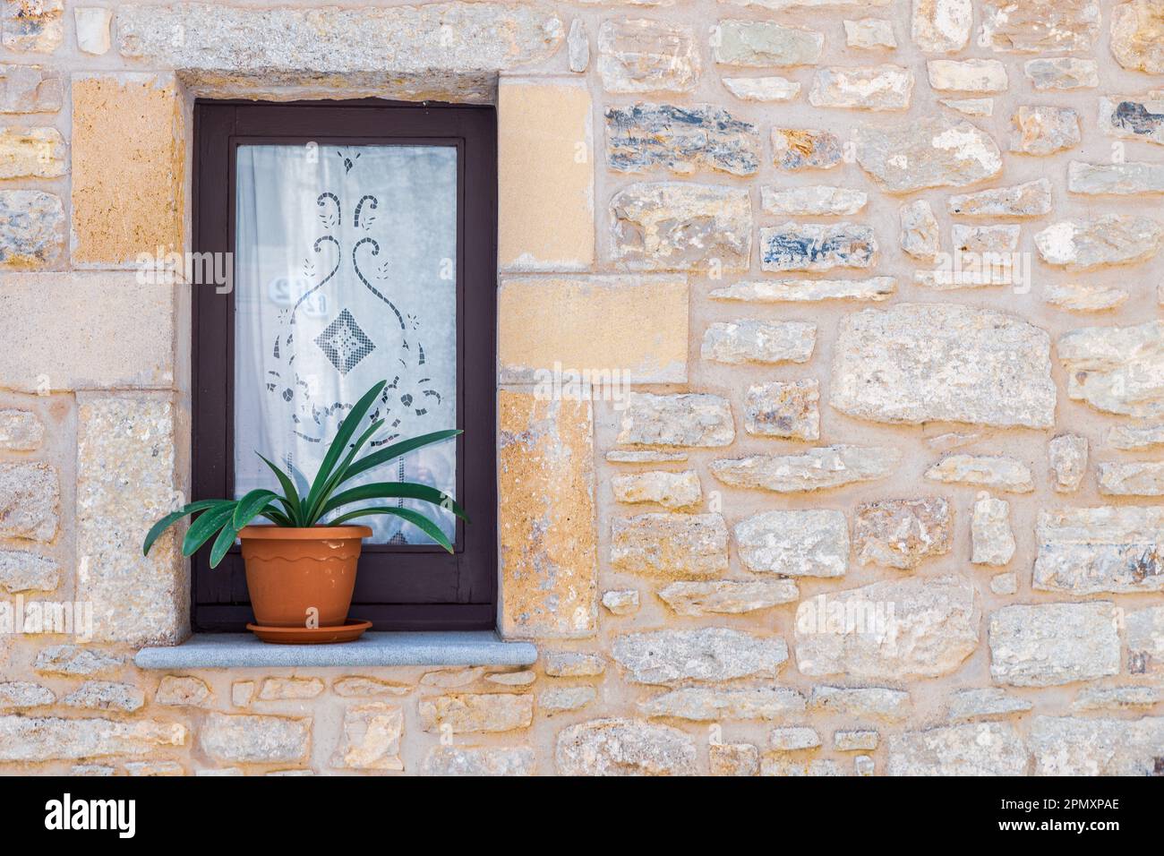 The ancient window on stone wall, for background Stock Photo - Alamy