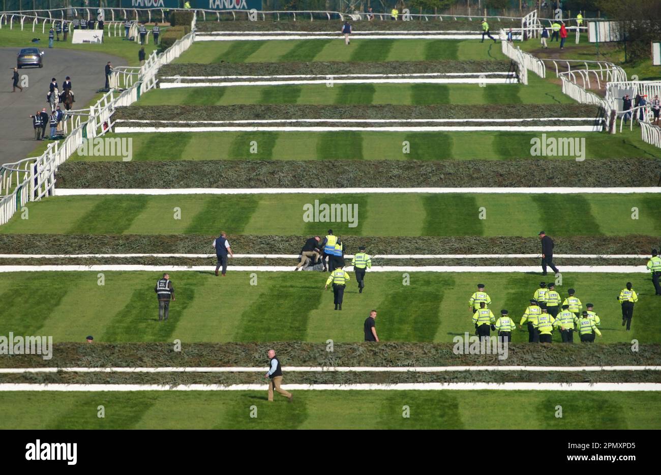 Police officers respond to Animal Rising activists attempting to invade ...