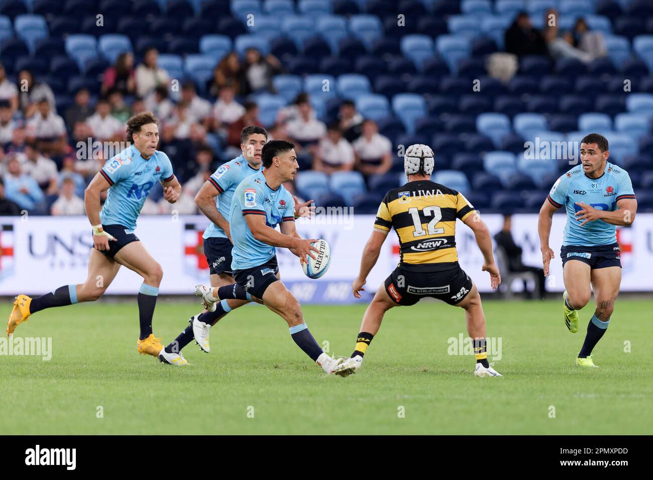 Lalakai Foketi of the Waratahs prepares to pass the ball during the ...