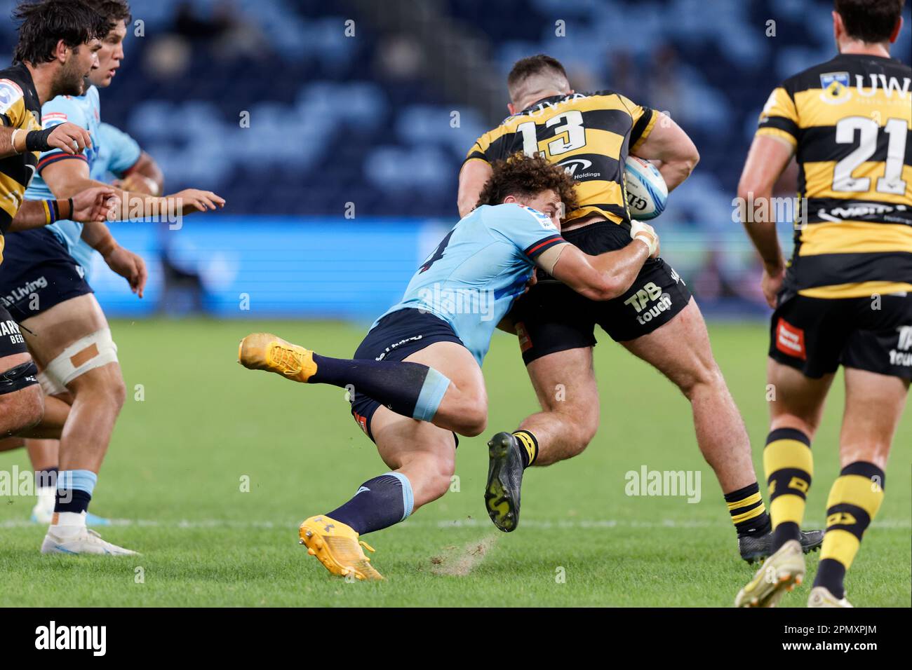 Sam Spink of the Force is tackled during the Super Rugby Pacific match ...
