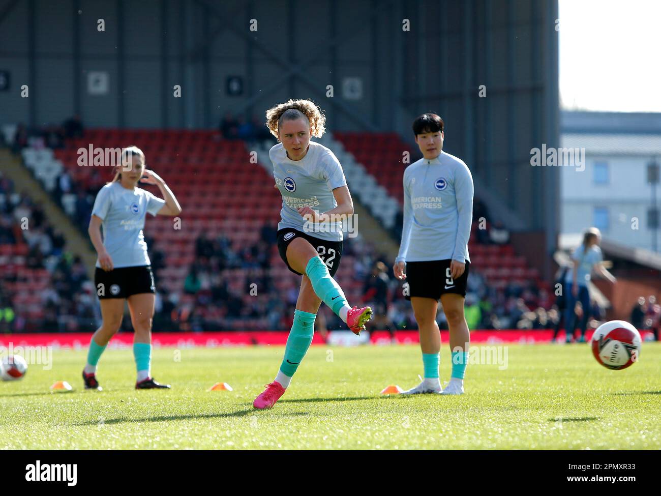Brighton and Hove Albion's Katie Robinson warms up on the pitch ahead ...