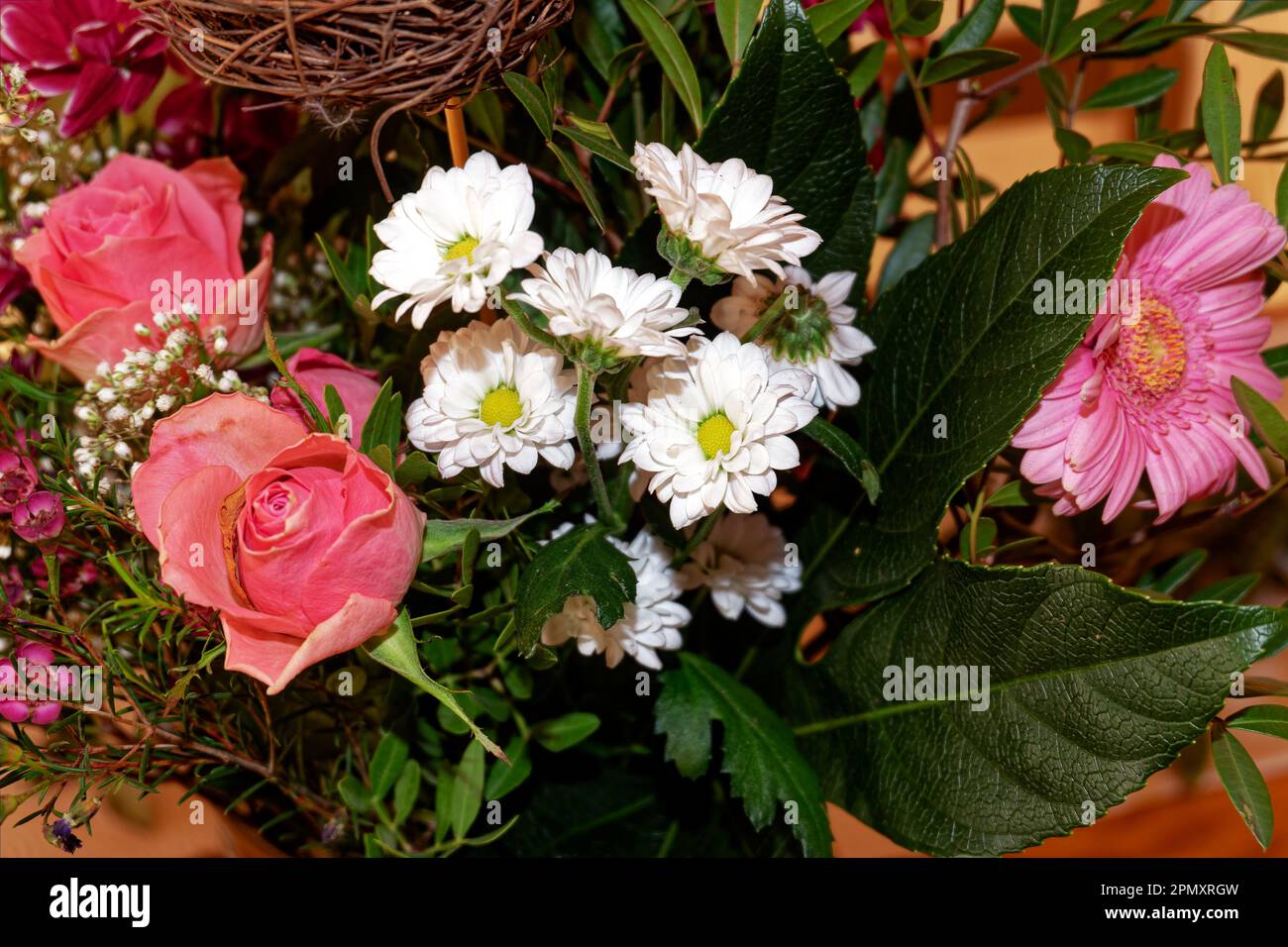 Bouquet with roses, baby's breath and motherwort Stock Photo - Alamy