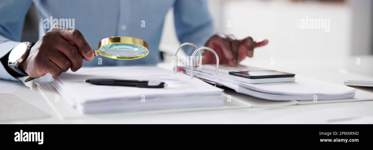 Fraud Investigation And Tax Audit. Investigator Or Auditor Using ...