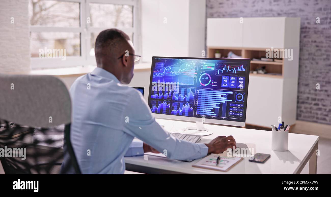 African American Data Analyst Using Data Analytics KPI Dashboard Stock ...