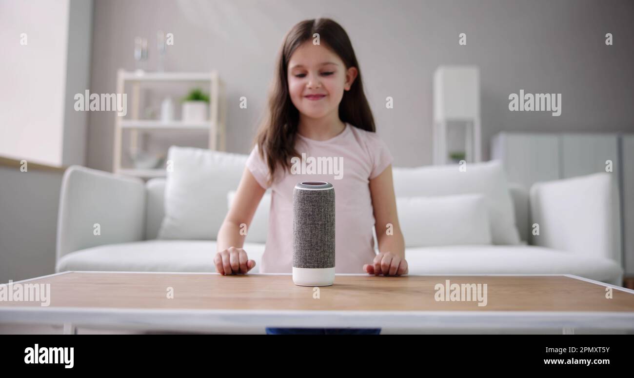Child Kid Using Smart Speaker And Voice Assistant Stock Photo - Alamy