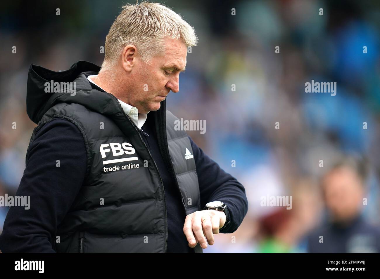 Leicester City manager Dean Smith looks at his watch before the Premier ...