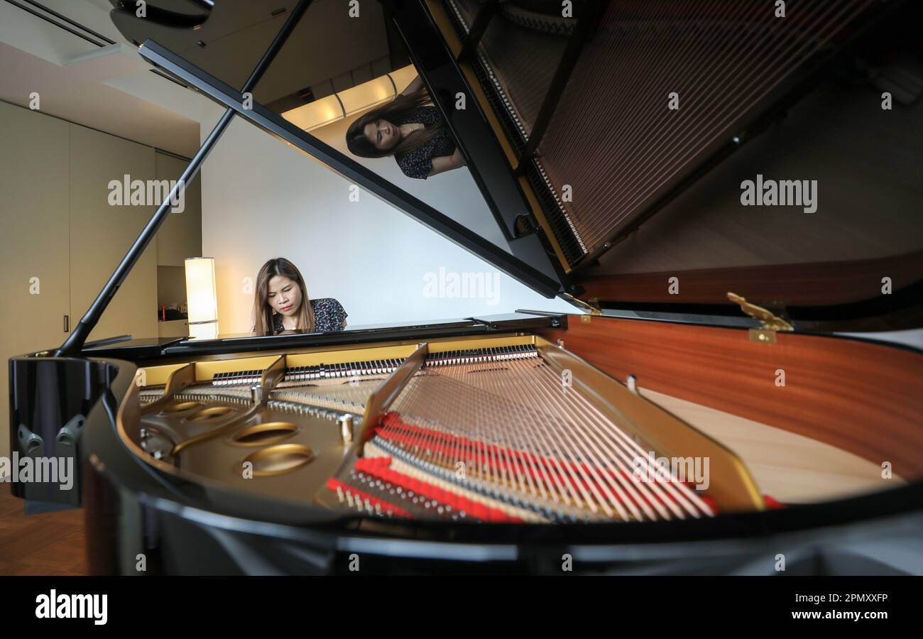 Pianist Rachel Cheung Wai-Ching with her piano in the Mid-Levels ...