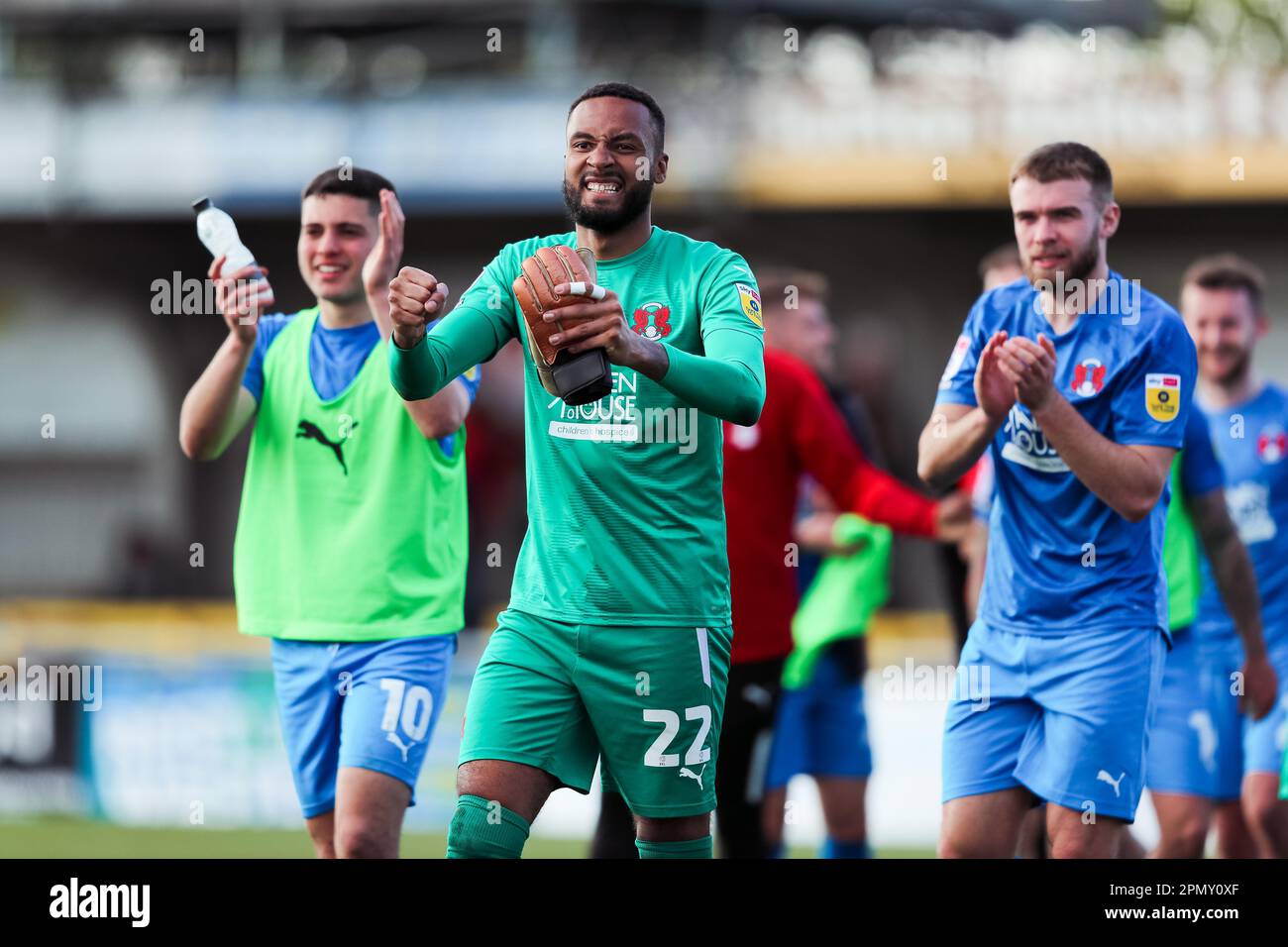 Leyton Orient goalkeeper Lawrence Vigouroux (centre) celebrates after ...