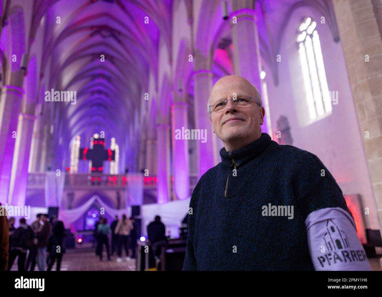 Erfurt, Germany. 15th Apr, 2023. Pastor Holger Kaffka accompanies the ...