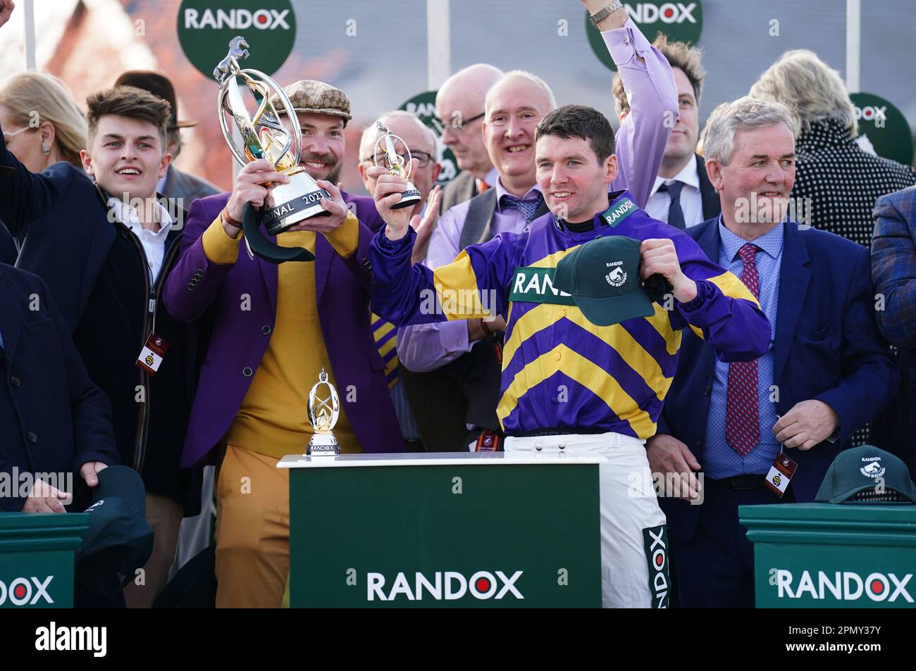 Derek Fox celebrates with owners Cameron Sword (left) and Thomas ...