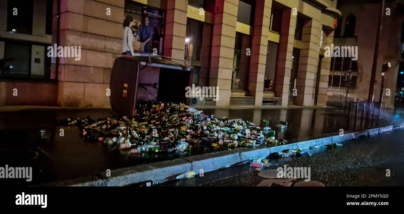 Upside down bottles collection container, Lyon, France Stock Photo - Alamy