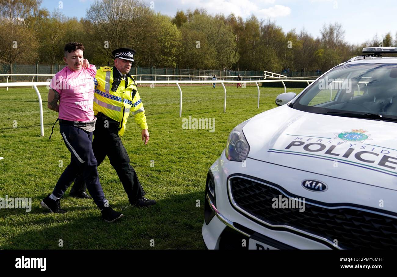 Protesters are detained by police during day three of the Randox Grand ...