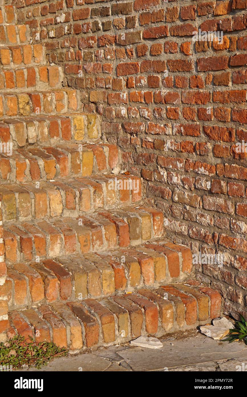 Stairs and wall made from orange bricks old structure exterior Stock ...