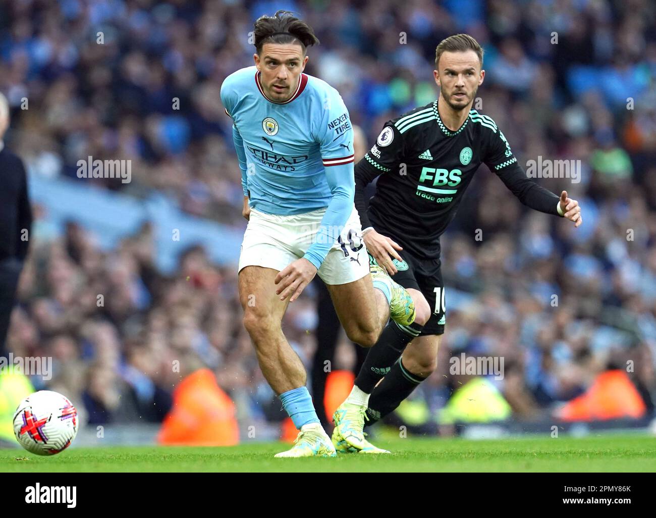 Manchester City's Jack Grealish (left) and Leicester City's James ...