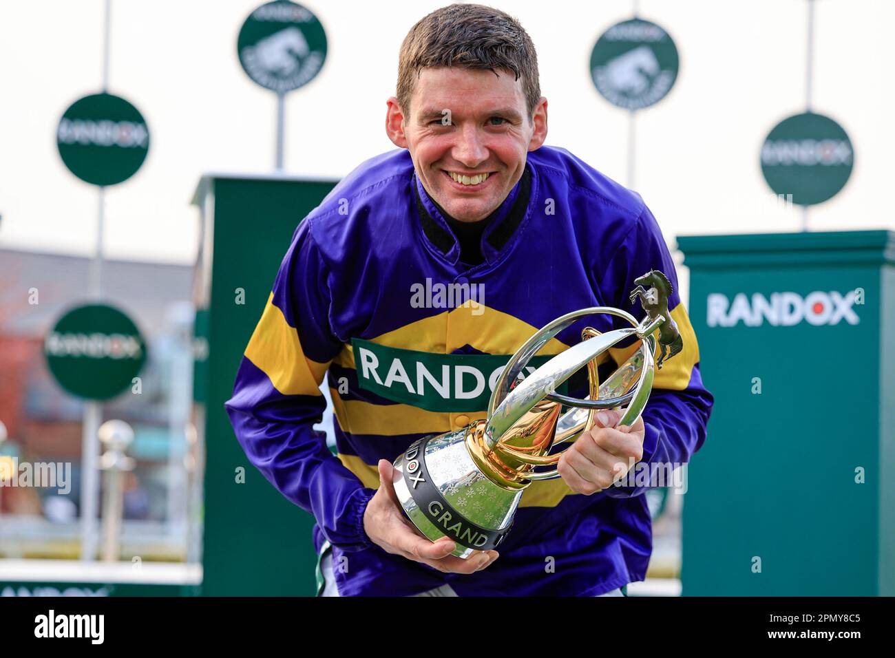 Derek Fox the Grand National winning jockey with the race trophy at The Randox Grand National ...