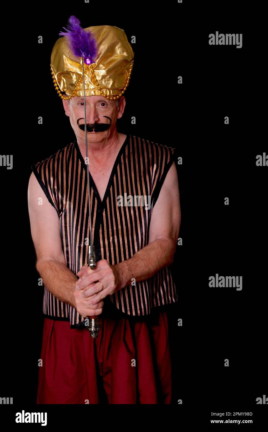 An elder sultan or sheik isolated over black Stock Photo - Alamy