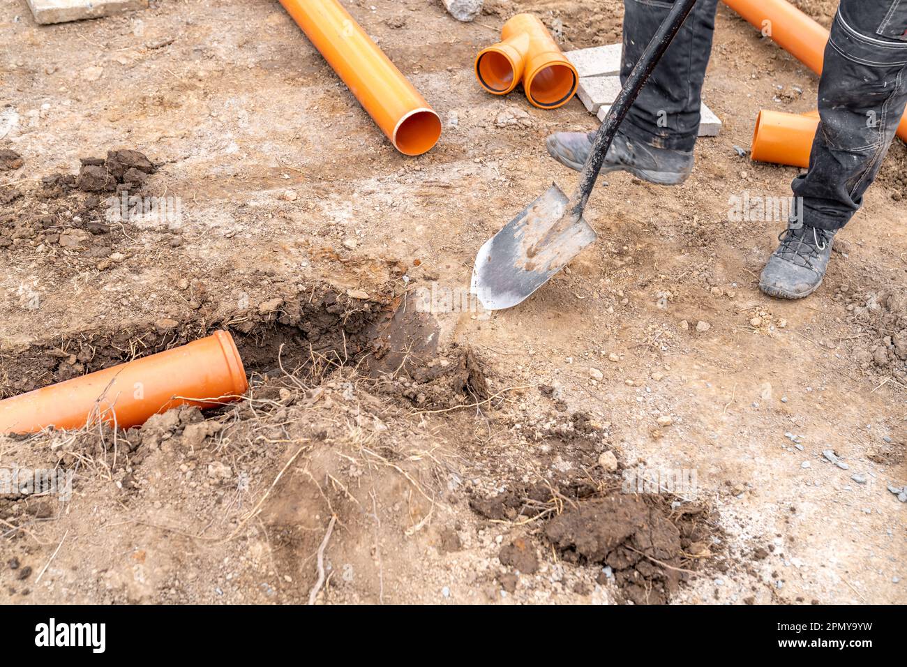 plastic pvc waste sewer pipe in the ground. construction site Stock ...