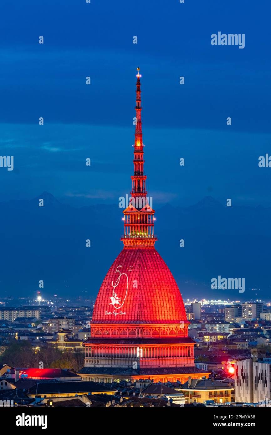 Turin, Italy - april 10 2023: Mole Antonelliana illuminated in red for ...