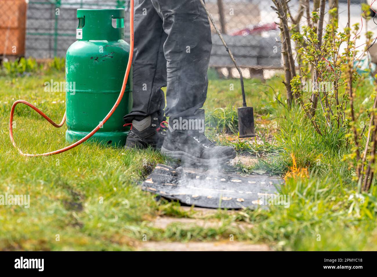 heating asphalt belts for waterproofing the foundation of the house ...