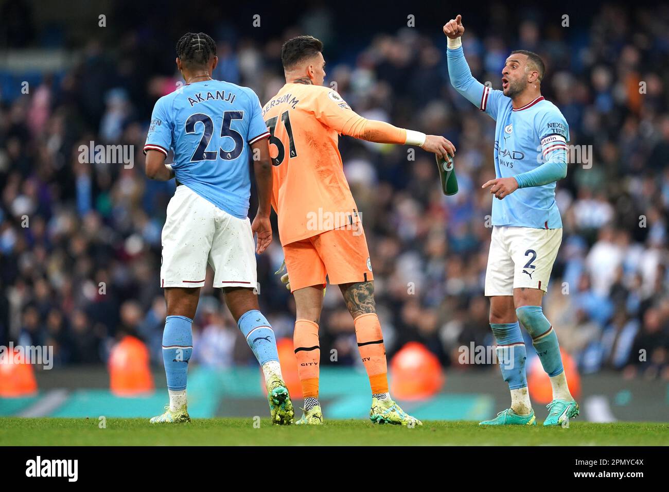 Manchester City's Kyle Walker (right) and goalkeeper Ederson in ...