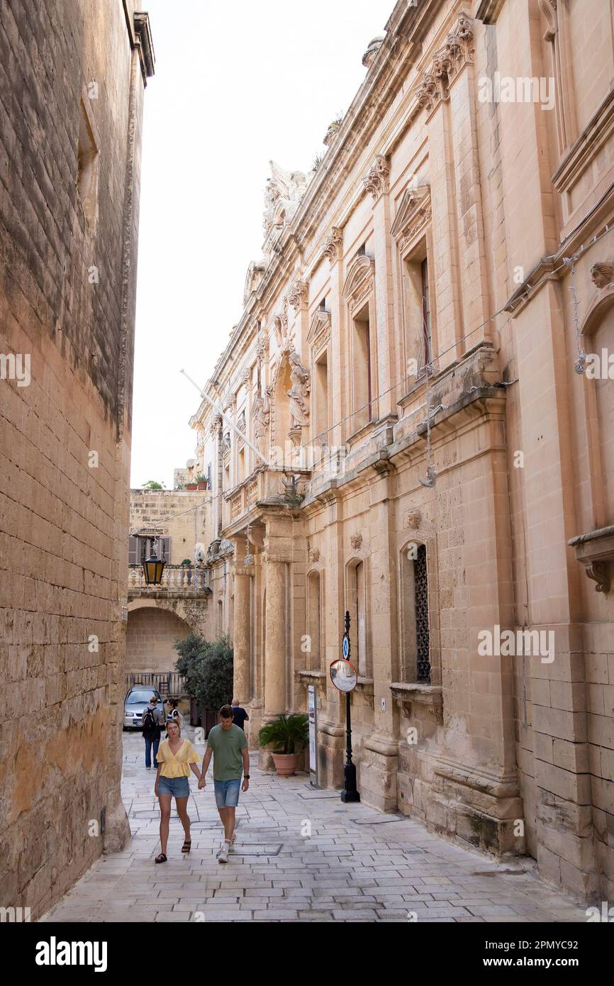 Mdina, Malta - November 13, 2022: Limestone buildings in the paved ...