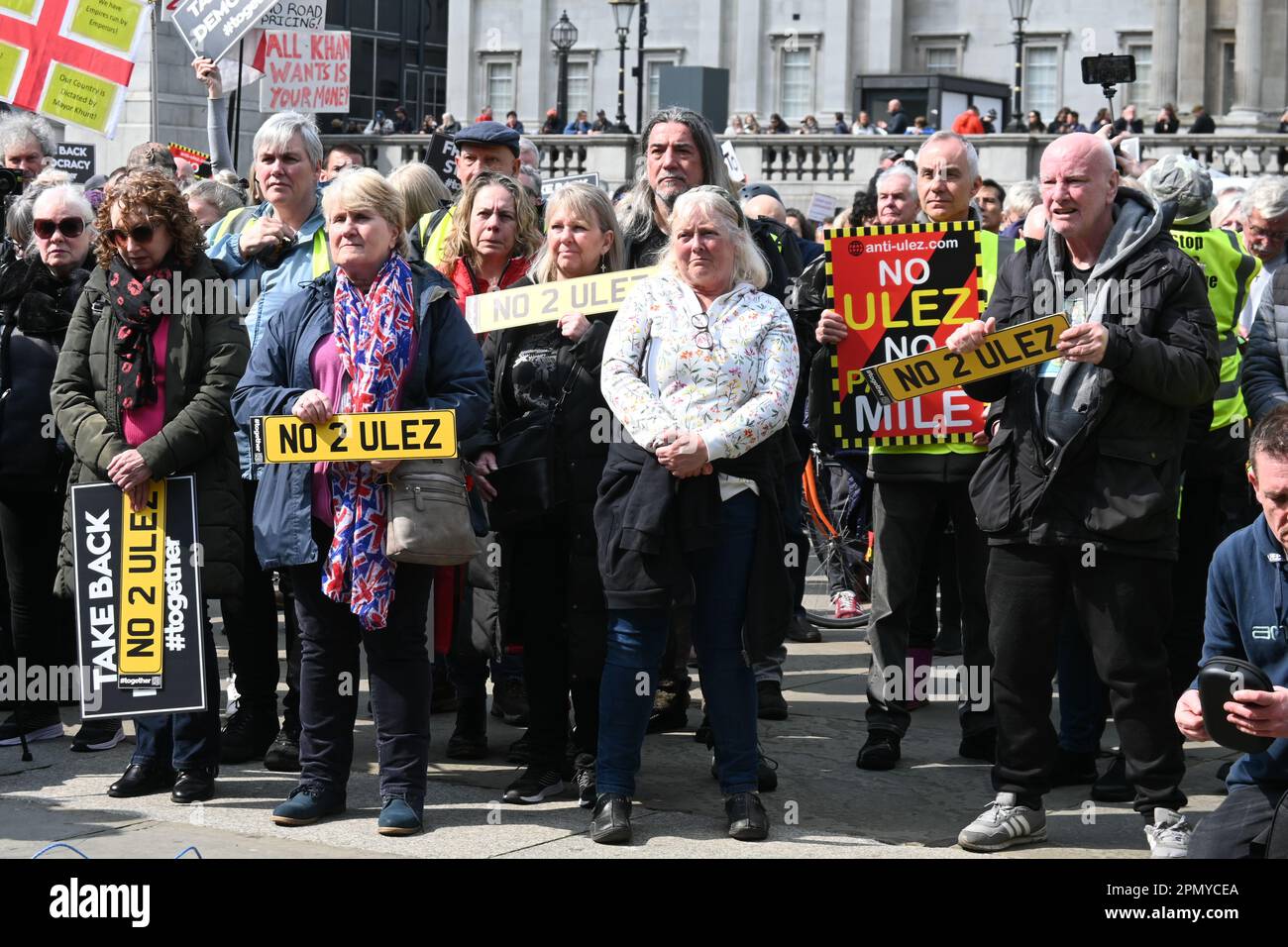 London, UK. 2023-04-15. Protesters hold up anti-ULEZ signs against Khan ...