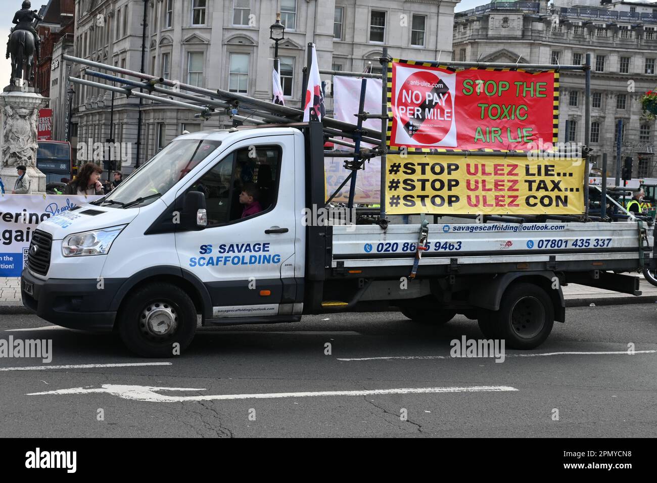 London, UK. 2023-04-15. Protesters hold up anti-ULEZ signs against Khan ...