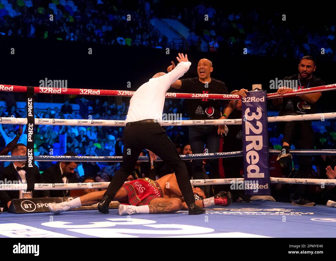The referee signals to end the fight after Kieran Smith is knocked down ...