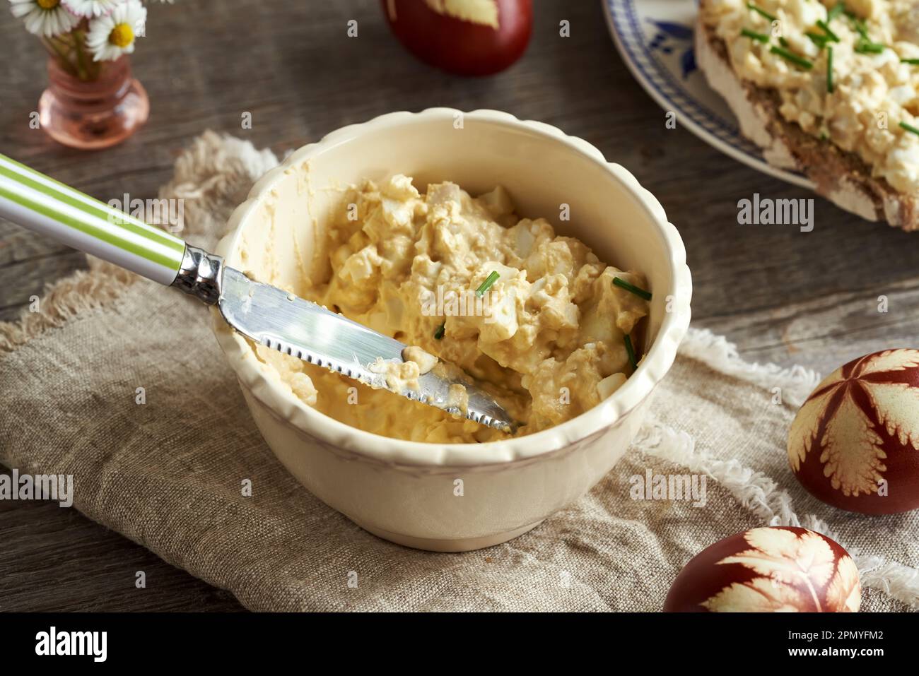 Using leftover hard boiled Easter eggs to prepare bread spread with mustard and cottage cheese ...