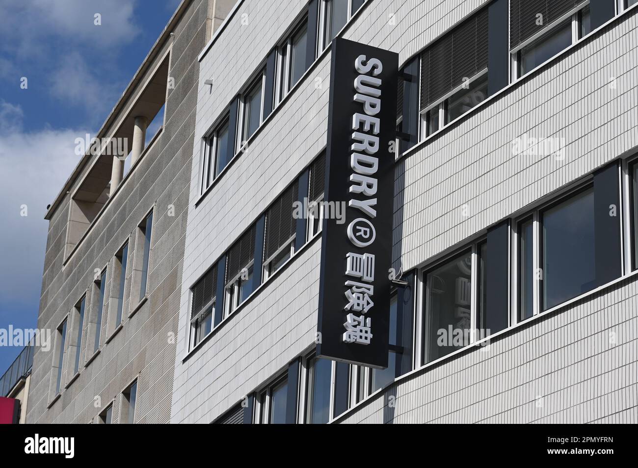 Cologne, Germany. 09th Apr, 2023. Sign with lettering and logo of the ...