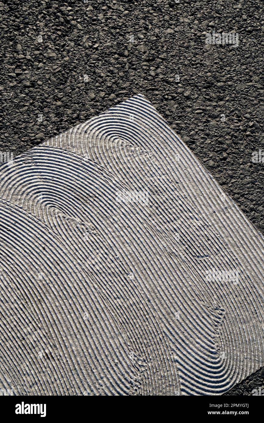 geometrical white painting of pedestrian crossing with texture on ...