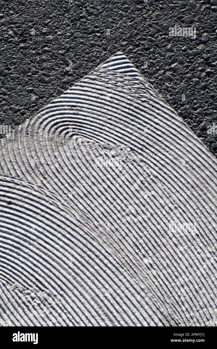 geometrical white painting of pedestrian crossing with texture on ...