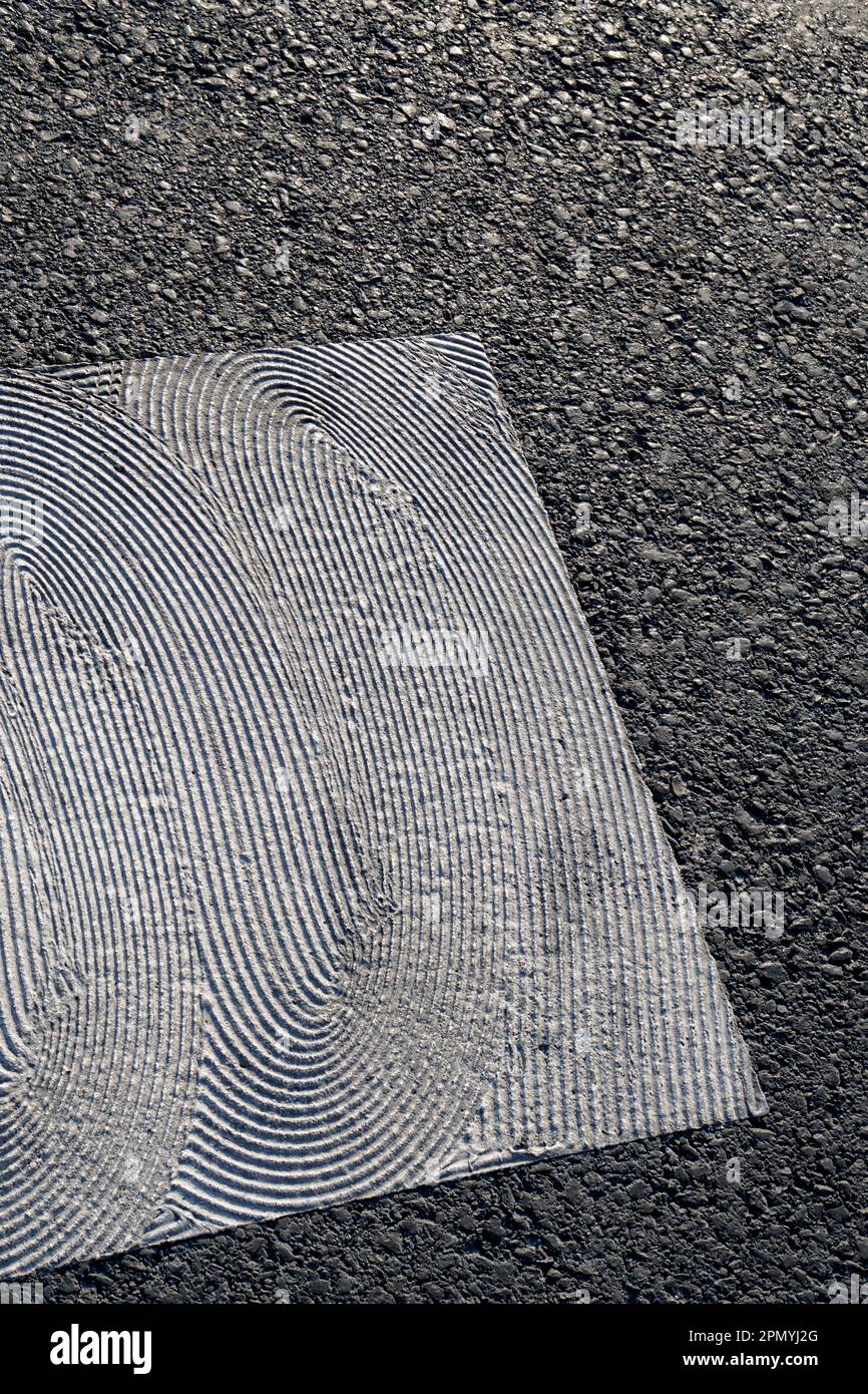 geometrical white painting of pedestrian crossing with texture on ...