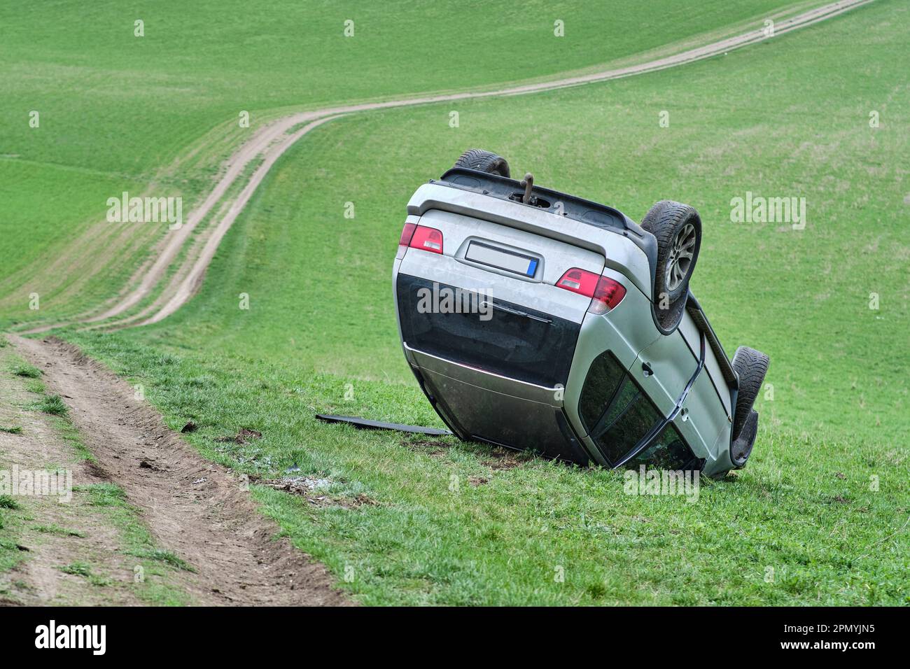Big SUV car after rollover on the roof in nature. Car crash in ...