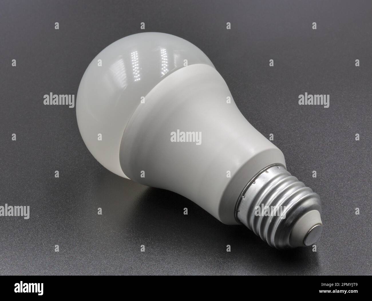 LED new technology light bulb closeup on black. Energy super saving ...