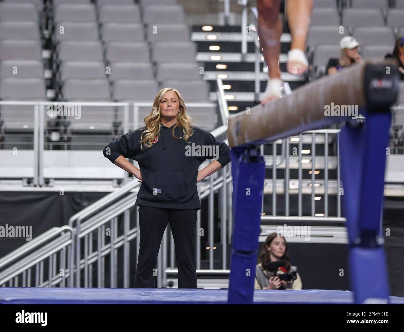April 15, 2023: Oklahoma head coach K.J. Kindler watches a gymnast warm ...