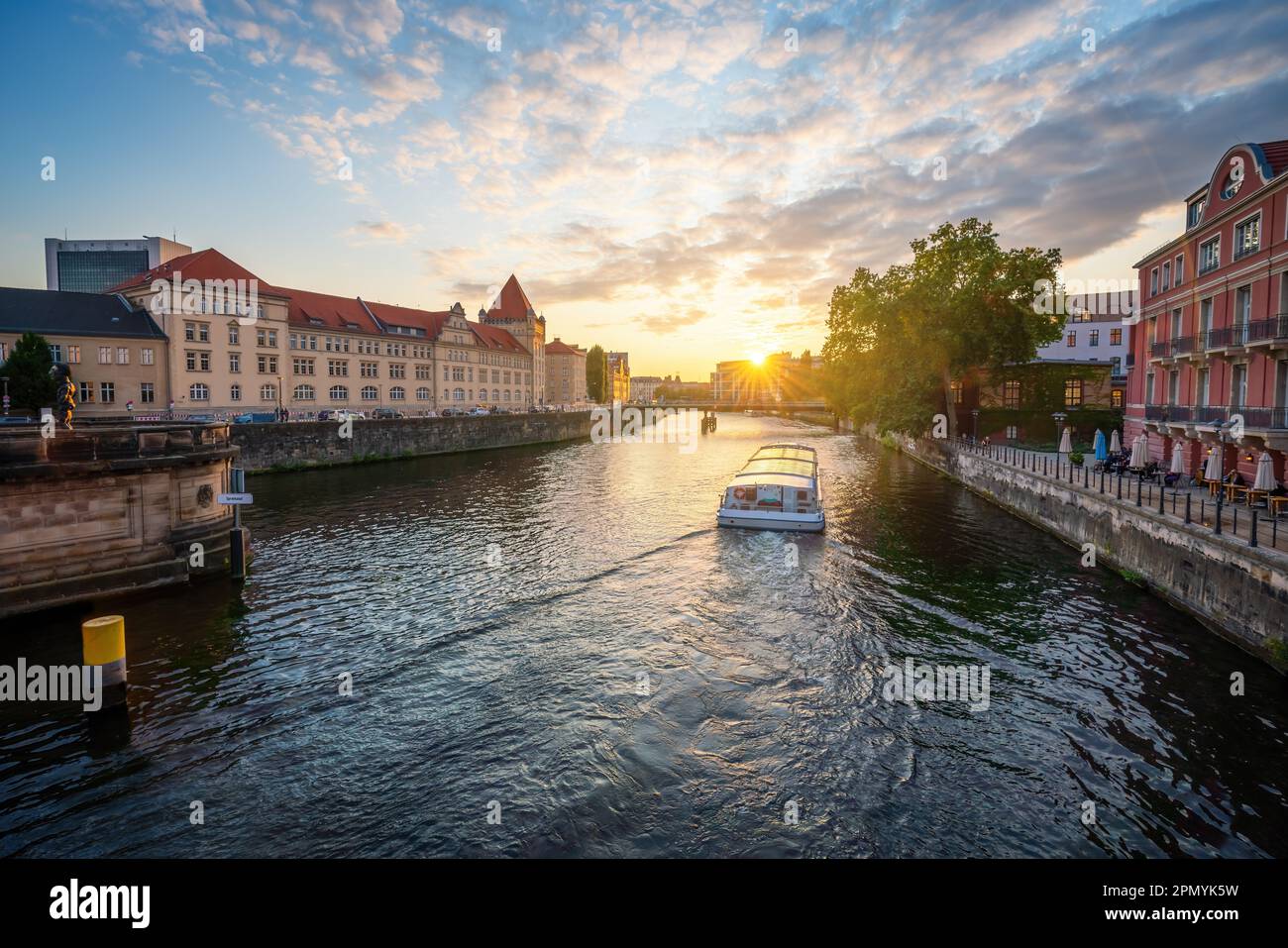 Beautiful sunset at Spree River with Boat - Berlin, Germany Stock Photo ...