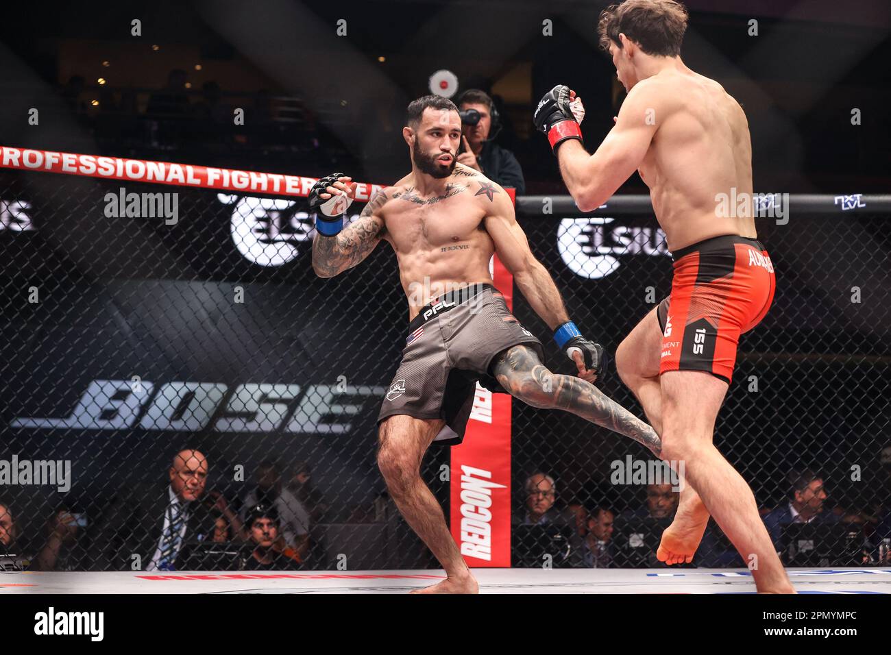April 14, 2023: (L-R) Lightweight Shane Burgos kicks Olivier Aubin-Mercier during the PFL 3 ...