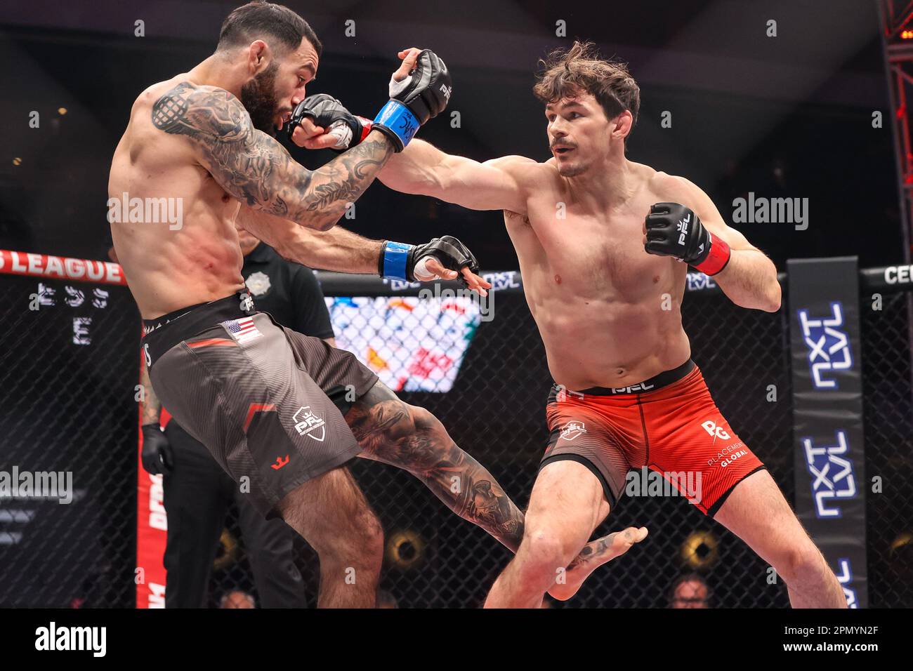 April 14, 2023: (R-L) Lightweight Olivier Aubin-Mercier punches Shane Burgos during the PFL 3 ...