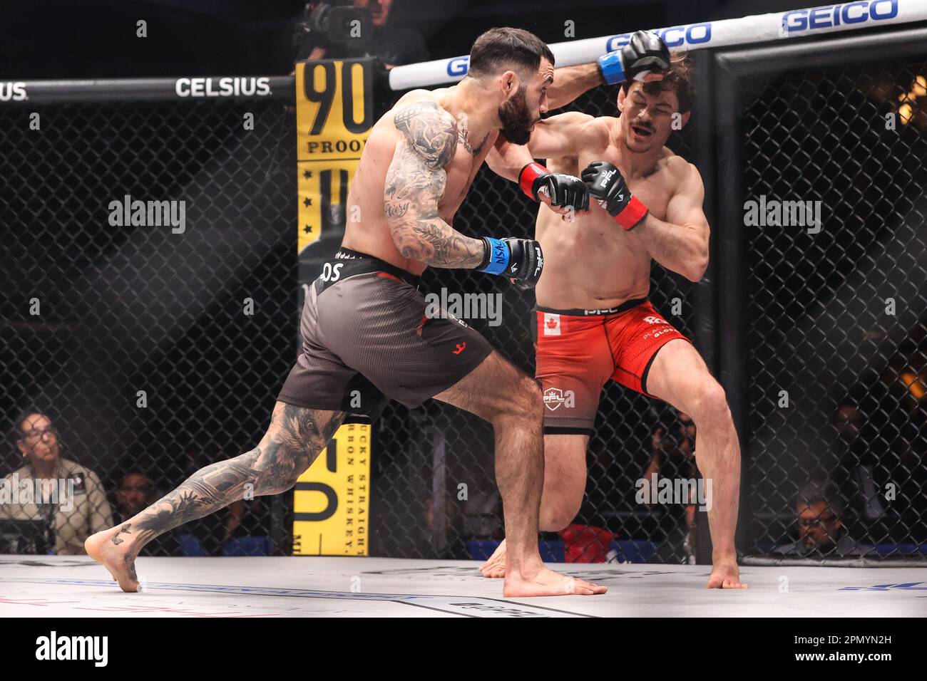 April 14, 2023: (L-R) Lightweight Shane Burgos and Olivier Aubin-Mercier exchange punches during ...