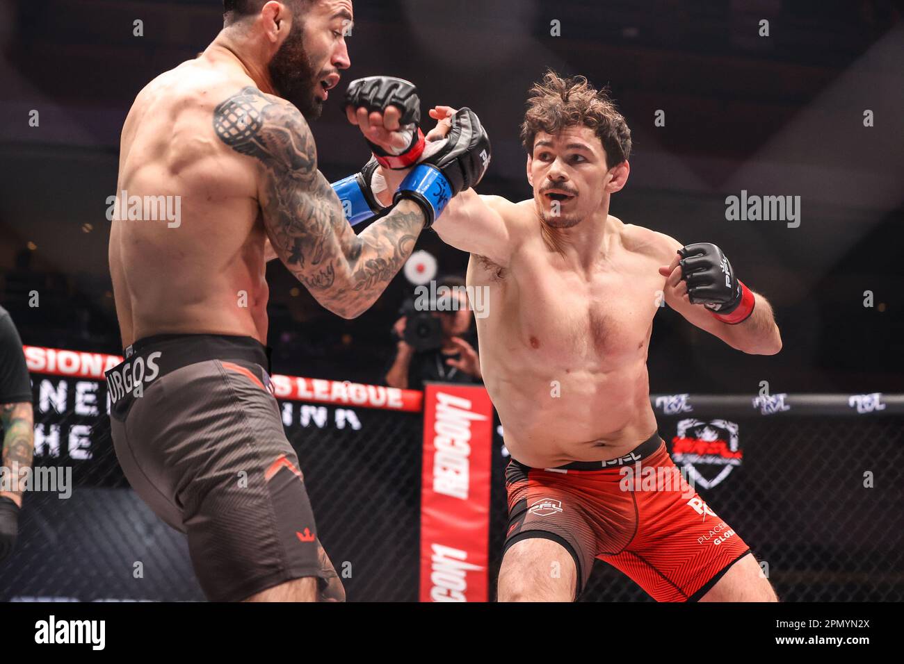 April 14, 2023: (R-L) Lightweight Olivier Aubin-Mercier punches Shane Burgos during the PFL 3 ...