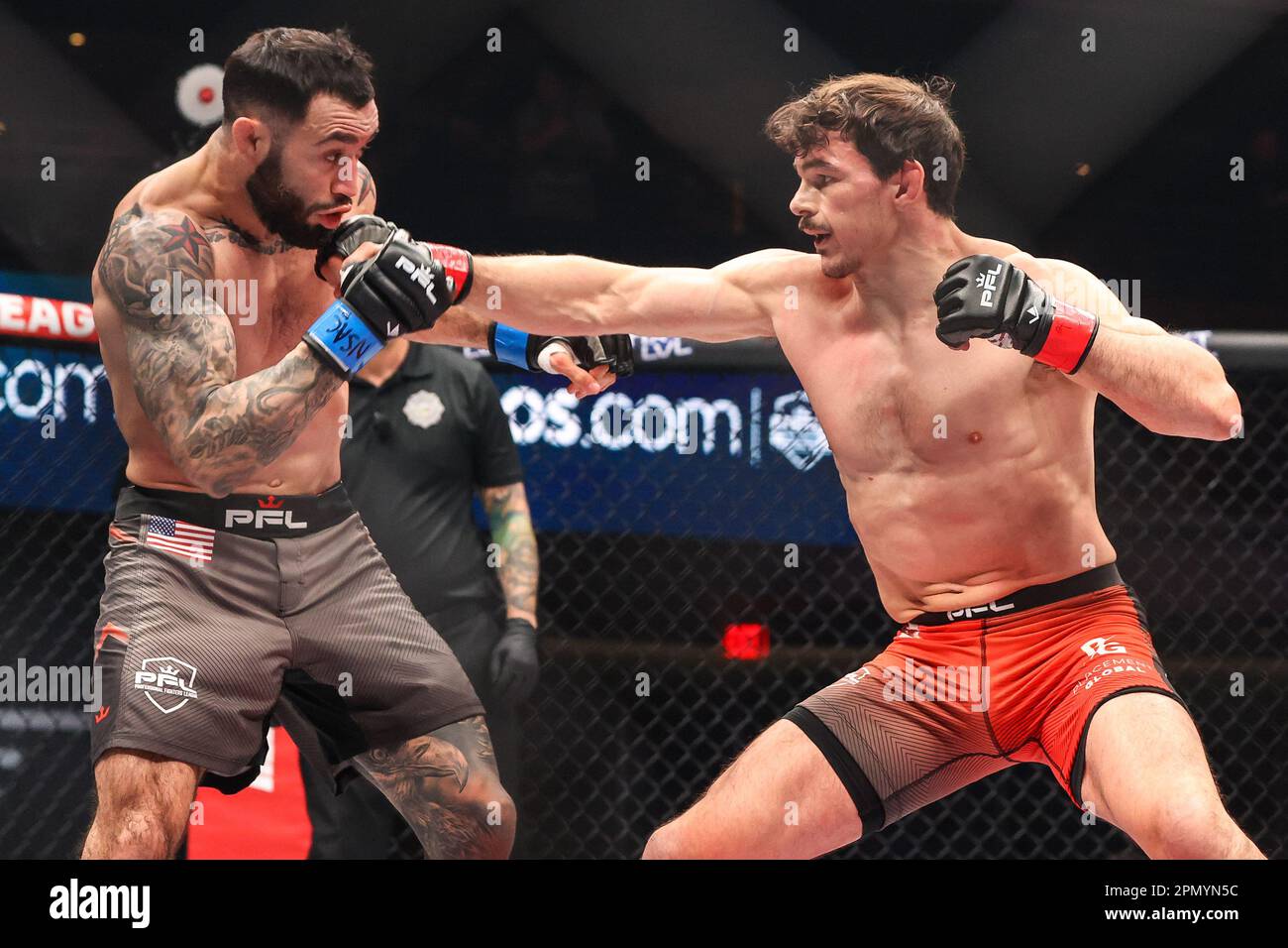 April 14, 2023: (R-L) Lightweight Olivier Aubin-Mercier punches Shane Burgos during the PFL 3 ...