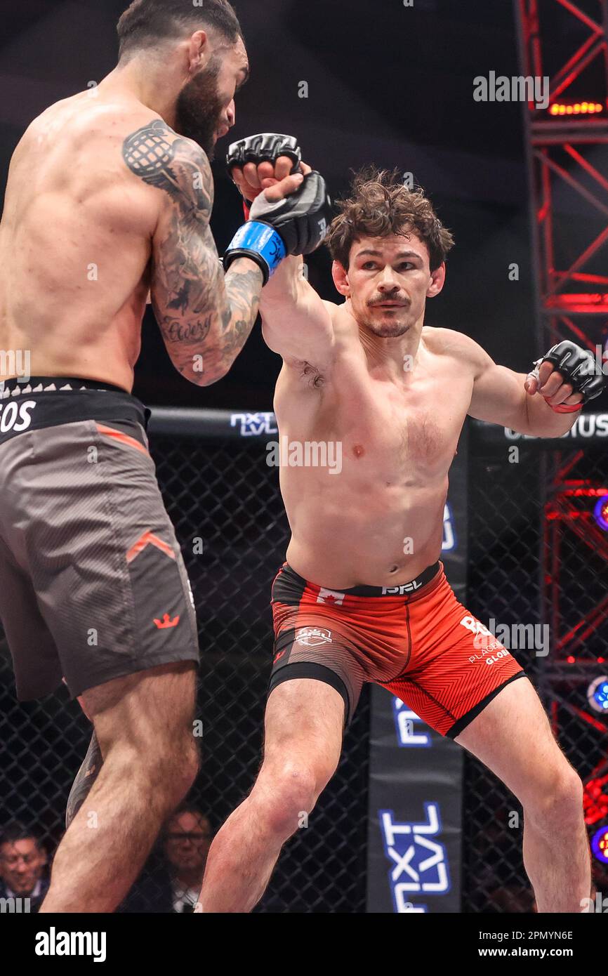April 14, 2023: (R-L) Lightweight Olivier Aubin-Mercier punches Shane Burgos during the PFL 3 ...